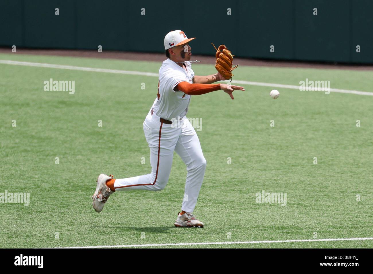 AUSTIN, TX - MAY 30: Texas infielder Adrian Rodriguez (24) throws out a ...