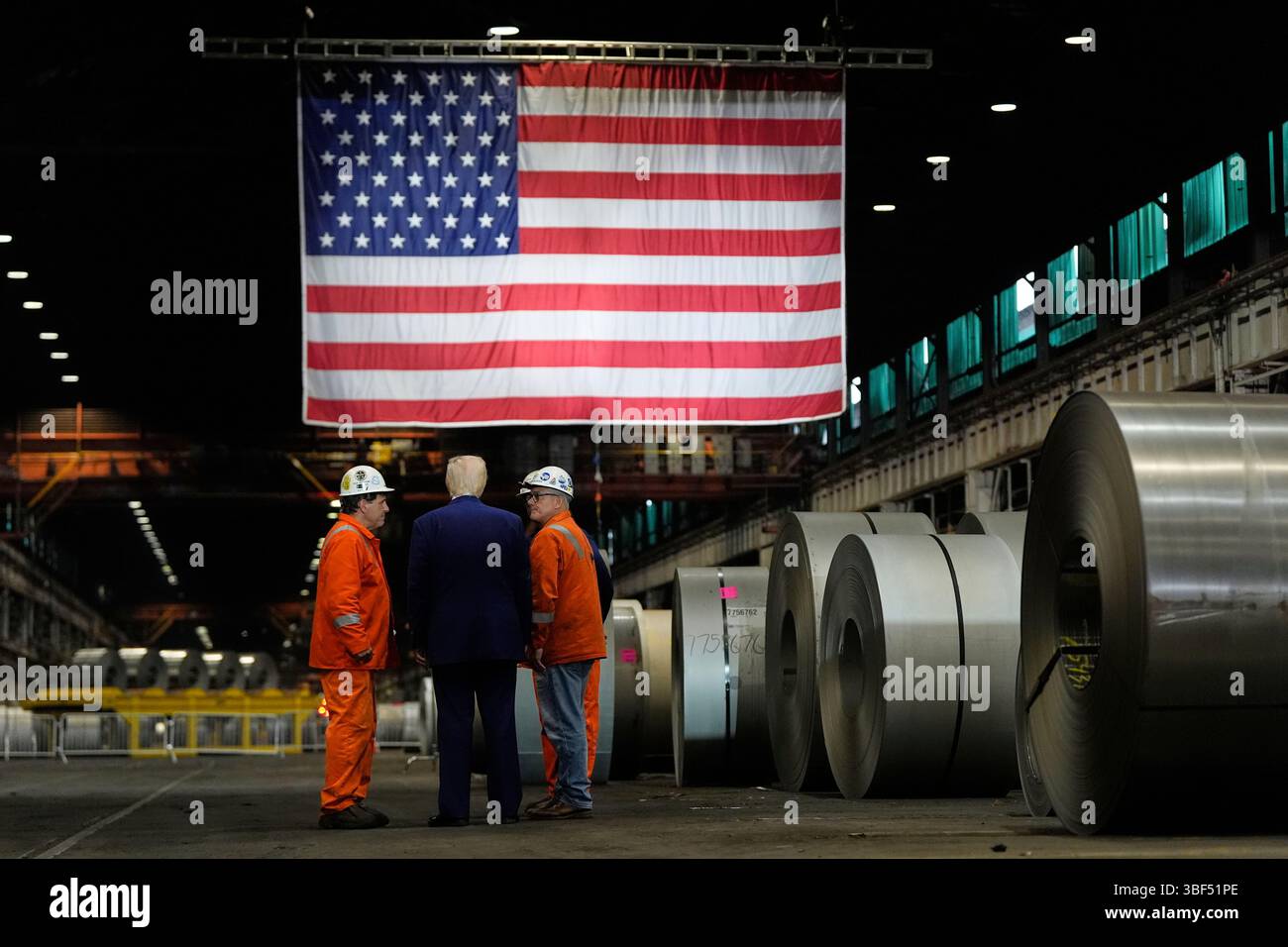 President Donald Trump talks to workers as he tours U.S. Steel ...