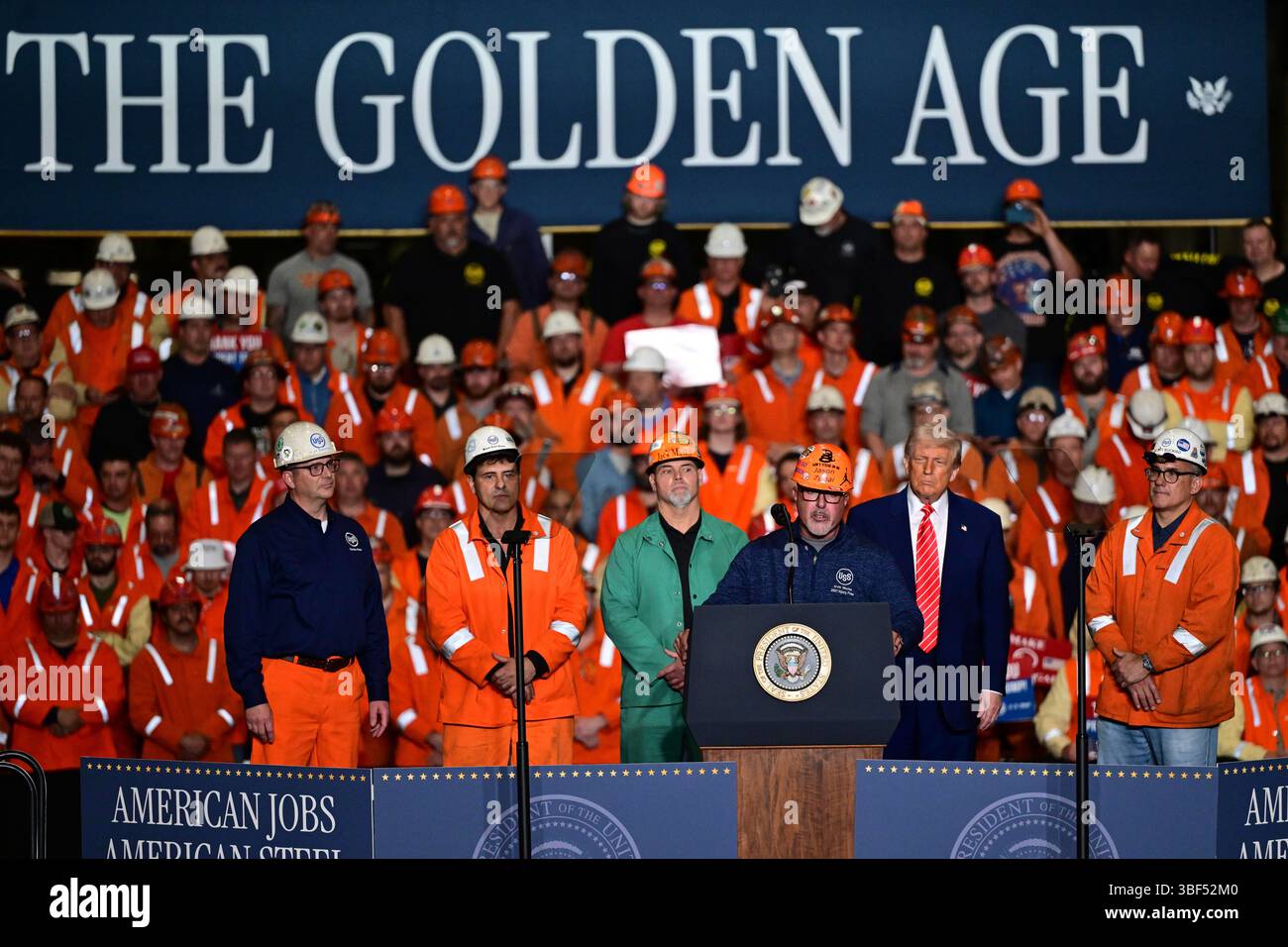 President Donald Trump listens as steelworkers speak at the U.S. Steel ...