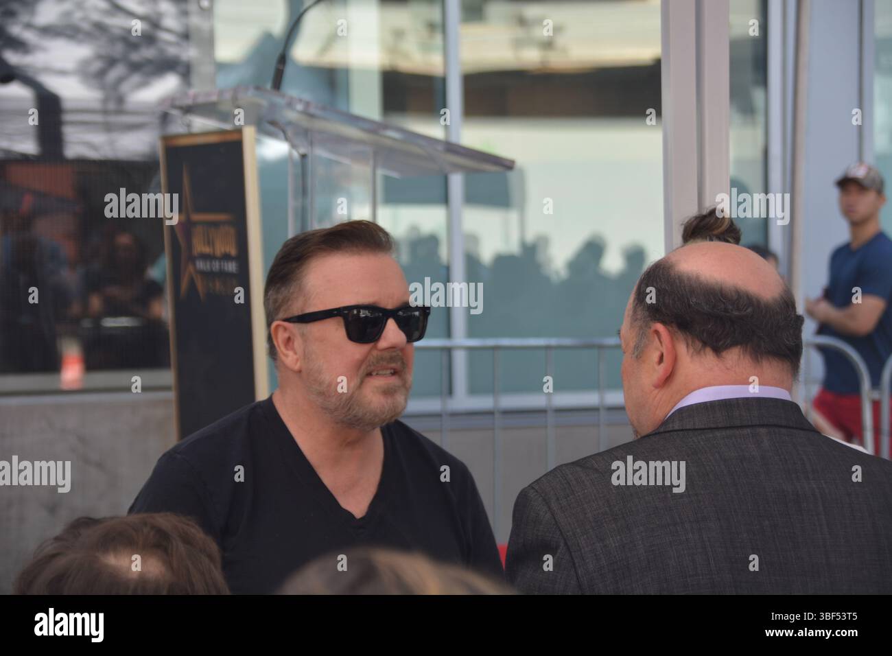 Ricky Gervais and Jason Alexander share a moment at Gervais’s Hollywood ...