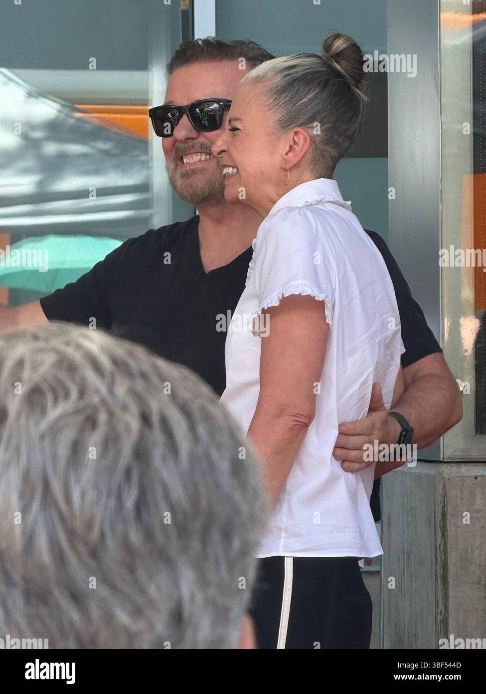 Ricky Gervais poses with longtime partner Jane Fallon at his Hollywood ...