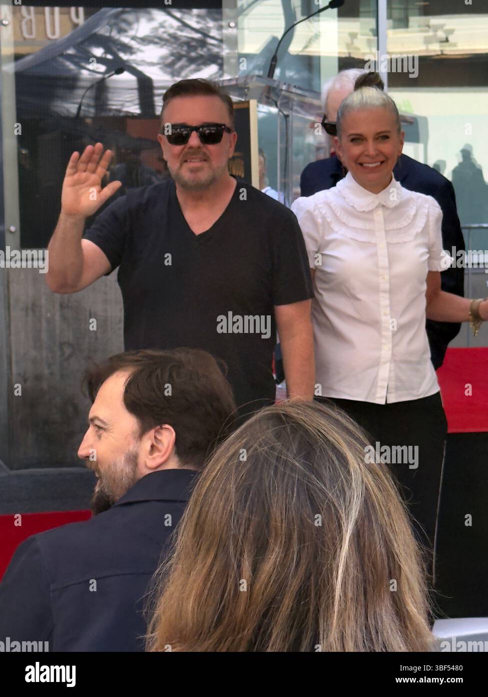 Ricky Gervais arrives with longtime partner Jane Fallon at his ...