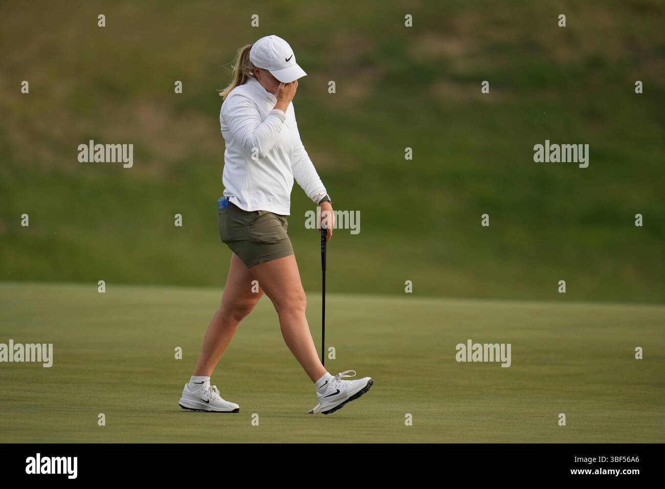 Maja Stark, of Sweden, reacts after missing a putt on the 17th hole ...