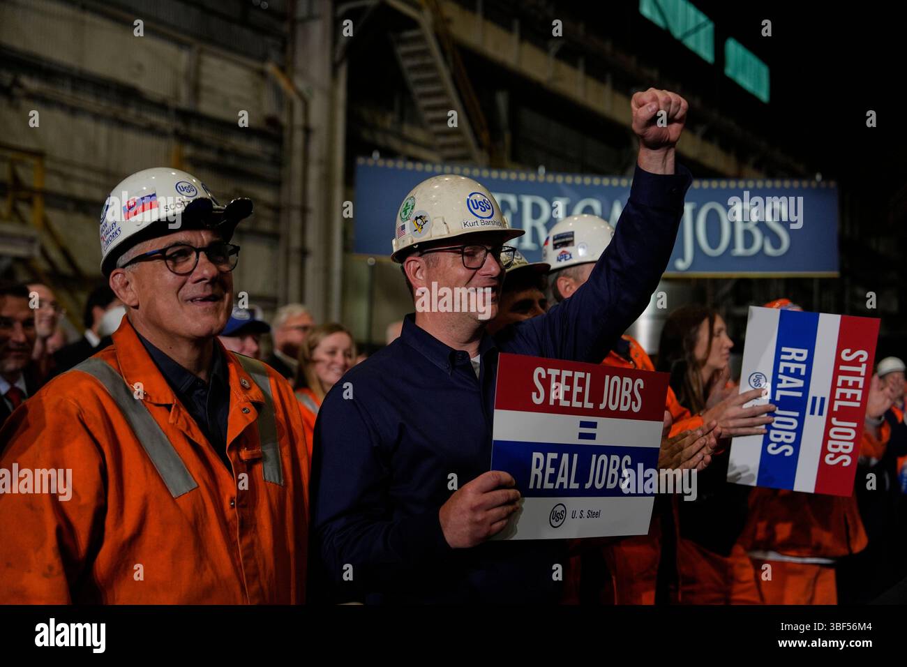 People listen as President Donald Trump speaks at U.S. Steel ...
