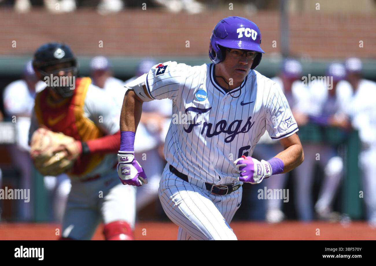 TCU utility Noah Franco (6) runs towards first base in front of ...