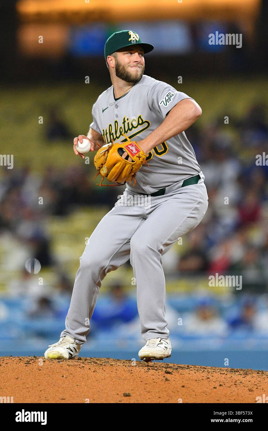 LOS ANGELES, CA - MAY 13: Athletics pitcher Justin Sterner (60) throws ...