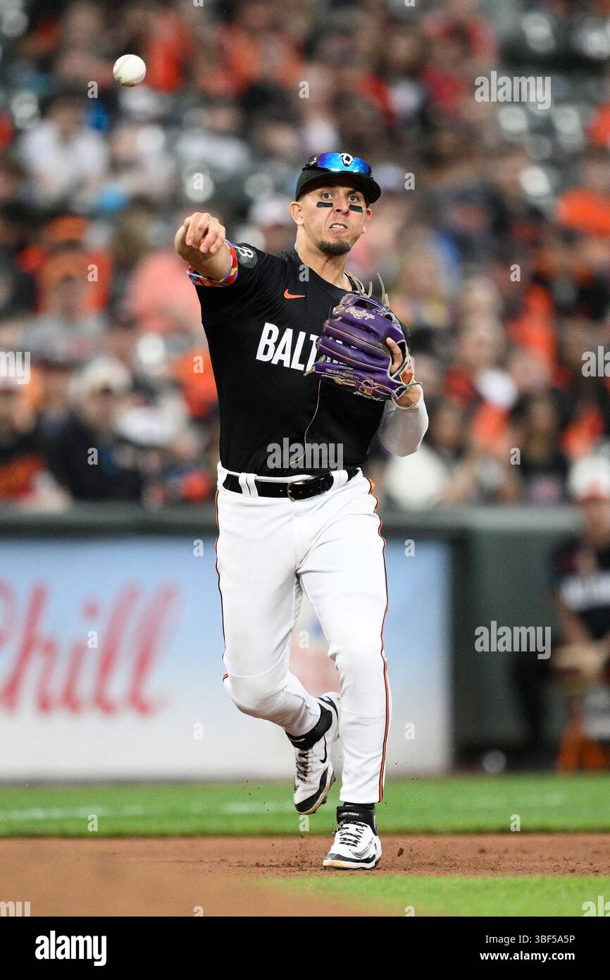 Baltimore Orioles third baseman Ramon Urias throws to first base to put out Chicago White Sox's ...