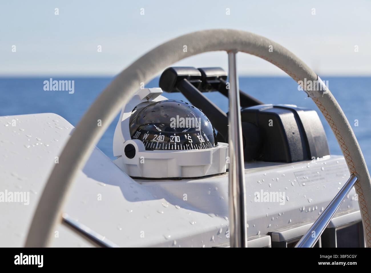 Sailing yacht control wheel and implement. Horizontal close up shot ...