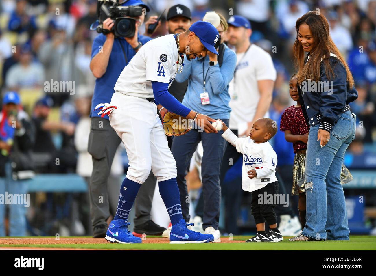 LOS ANGELES, CA - MAY 13: Mookie Betts plays with his son Kaj as his ...