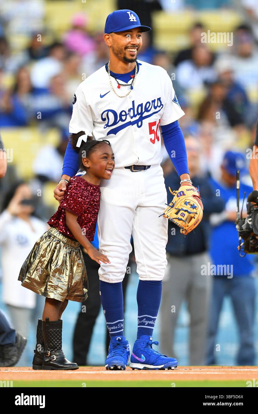 LOS ANGELES, CA - MAY 13: Mookie Betts plays with his daughter Kynlee ...