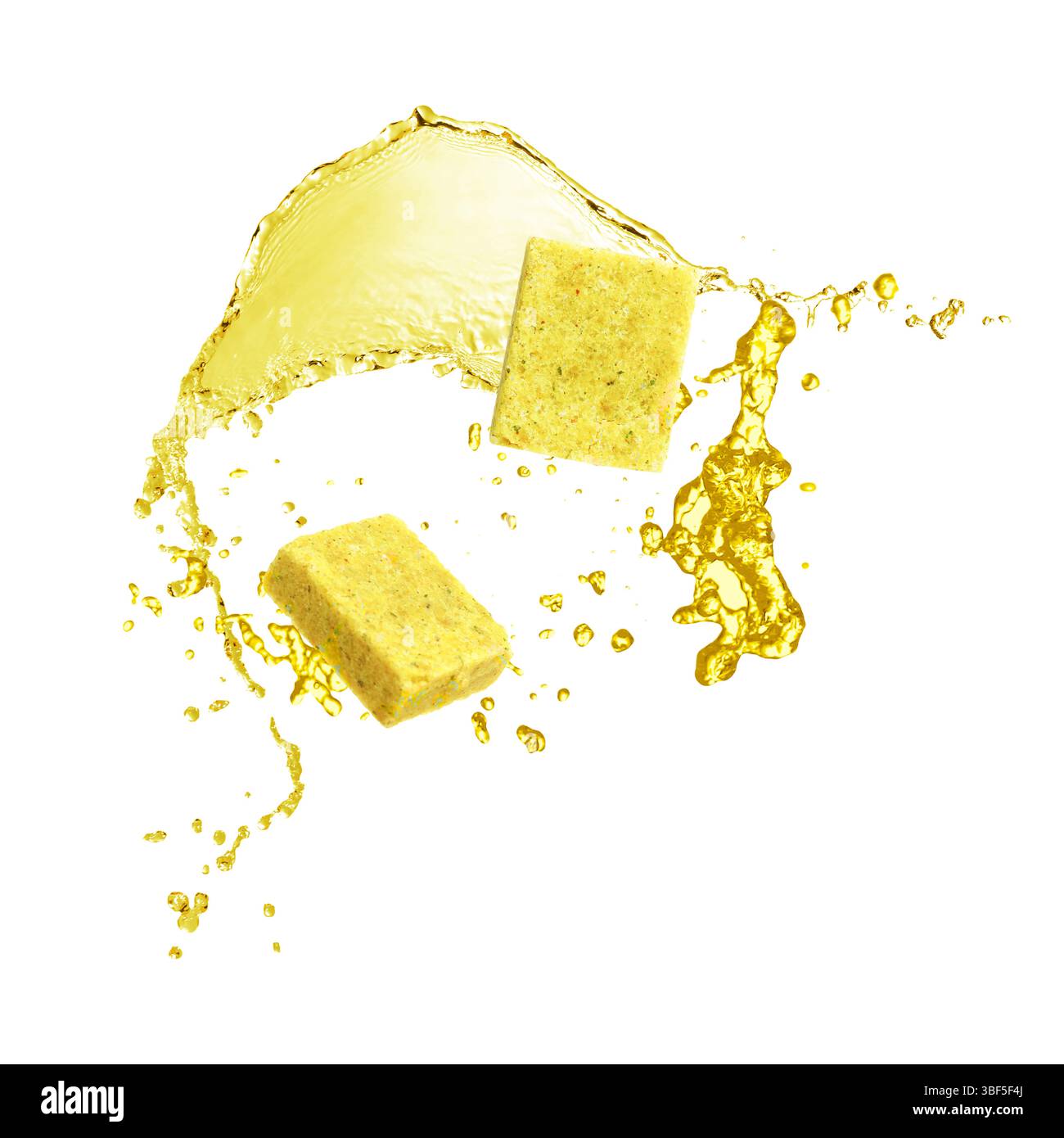 Splash of bouillon and stock cubes in air on white background Stock ...