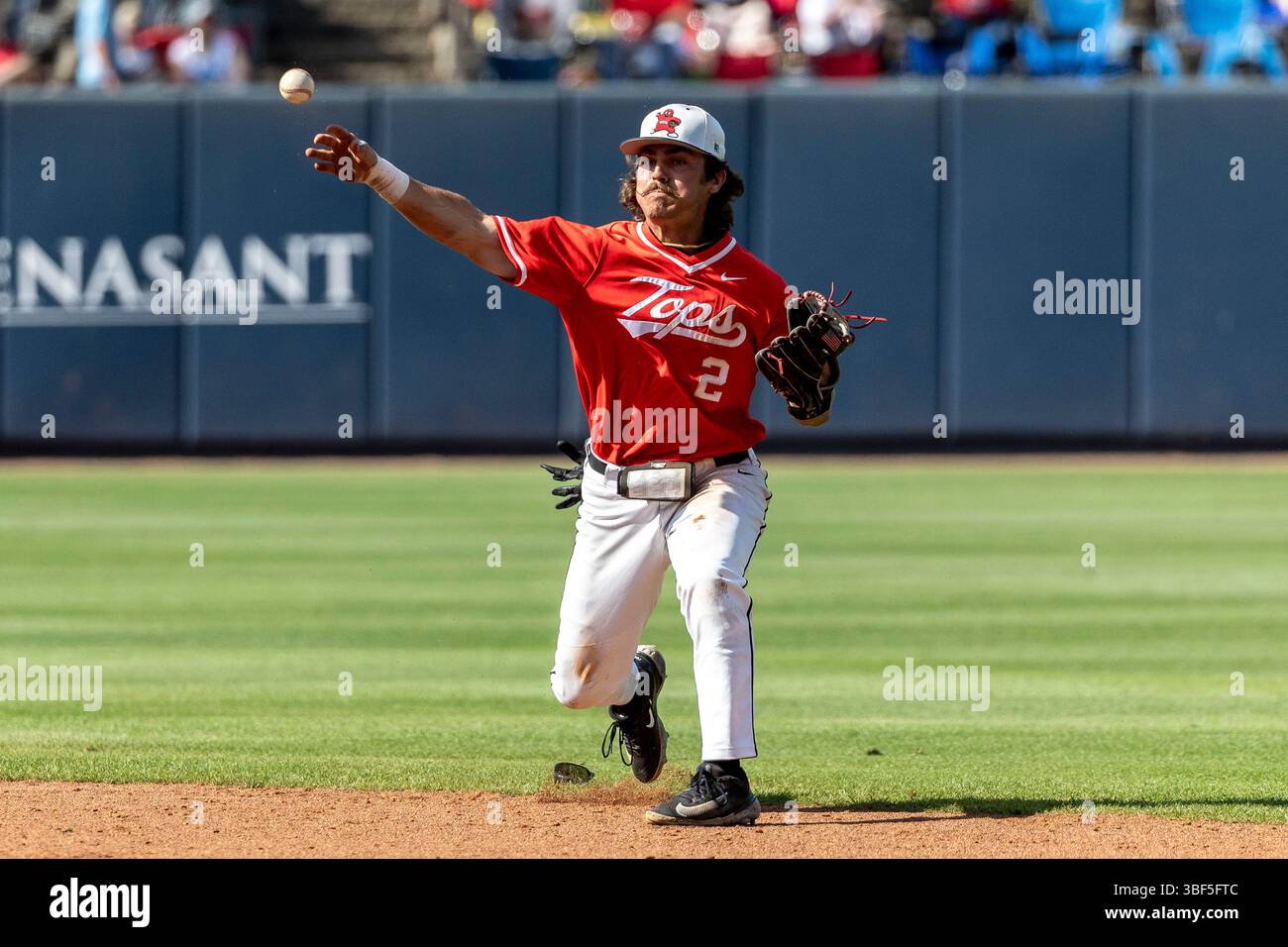 Western Kentucky infielder Austin Haller (2) throws to first base for ...