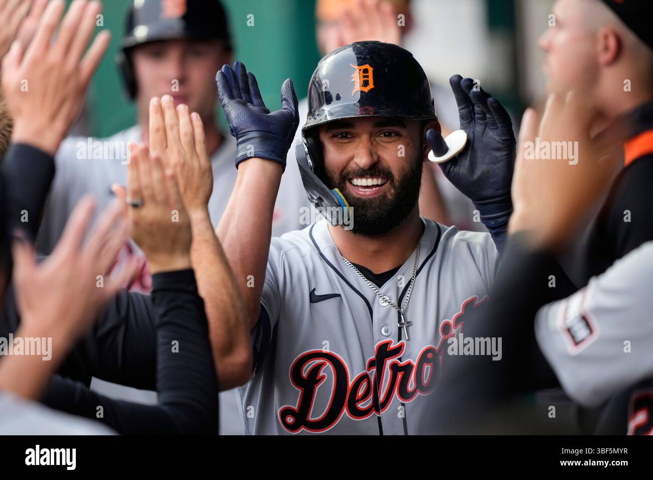 Detroit Tigers' Riley Greene celebrates in the dugout after hitting a ...