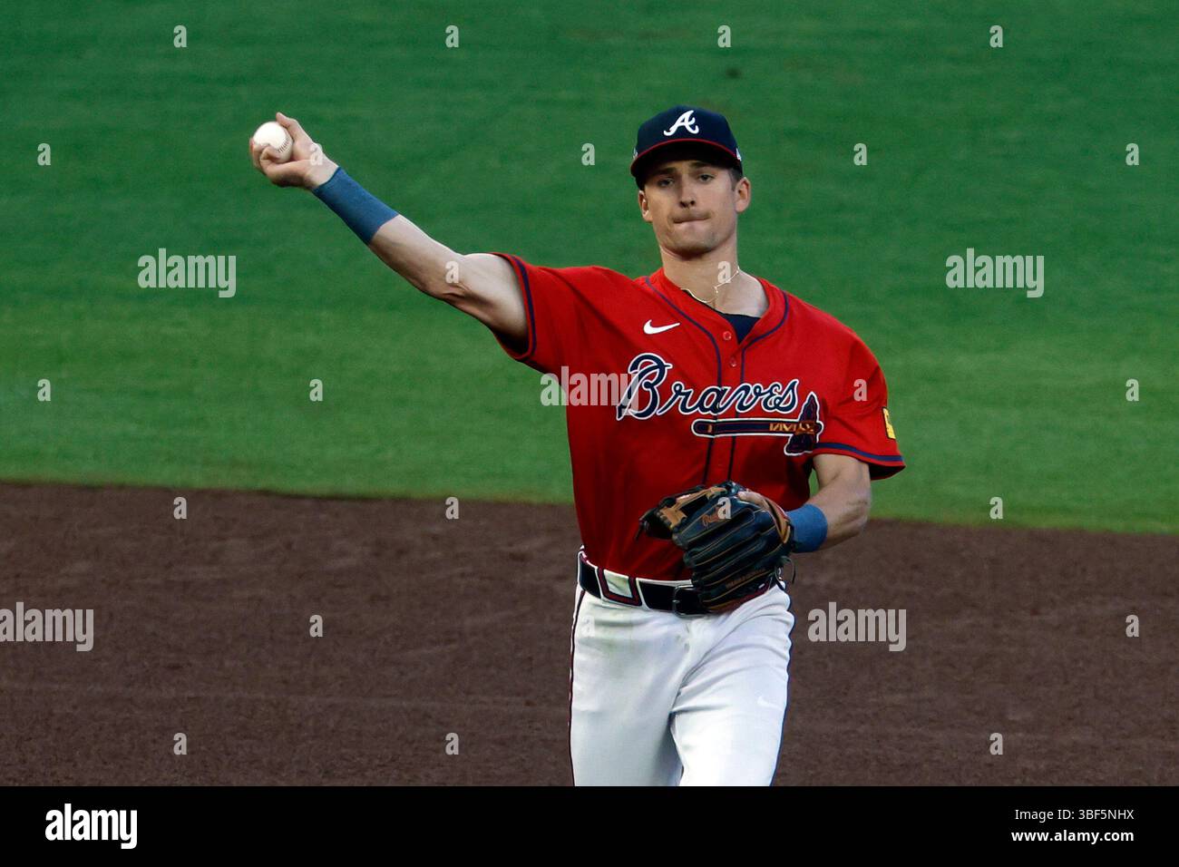 Atlanta Braves shortstop Luke Williams throws to first for the out on ...