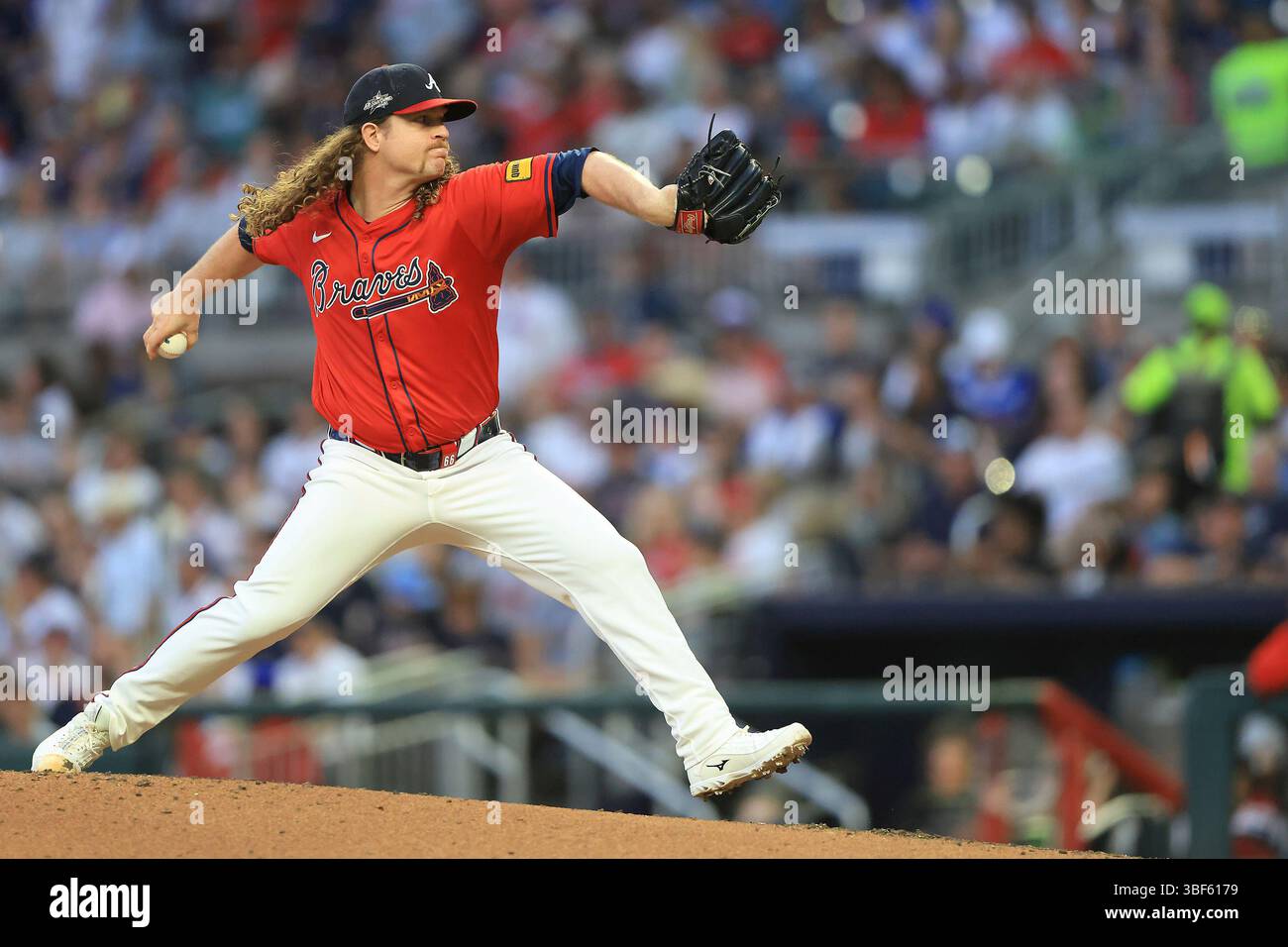 ATLANTA, GA - MAY 30: Grant Holmes #66 of the Atlanta Braves pitches ...