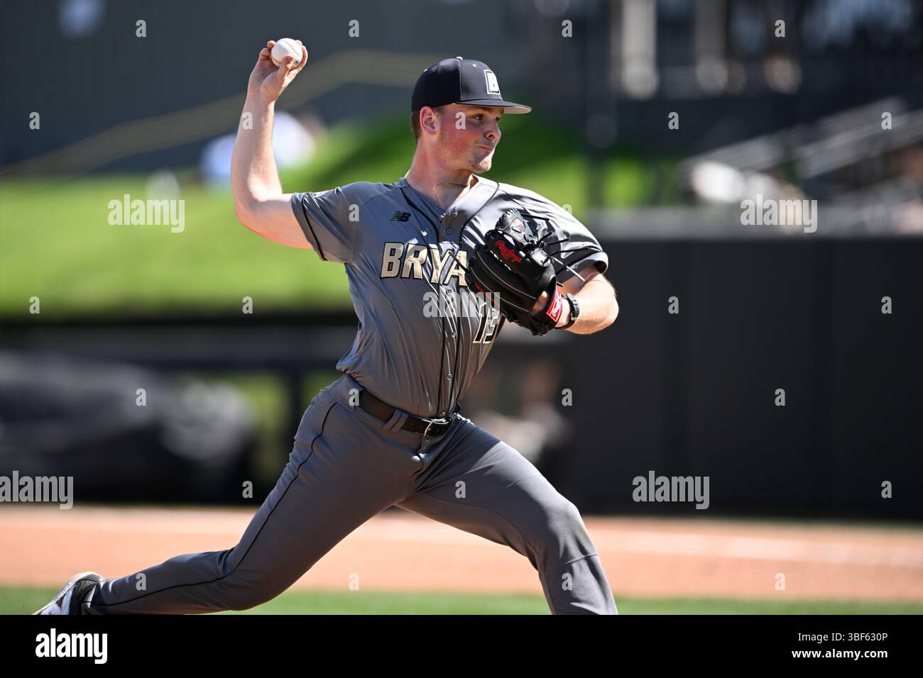 Bryant pitcher Brooks Ey (13) throws during an NCAA college baseball ...
