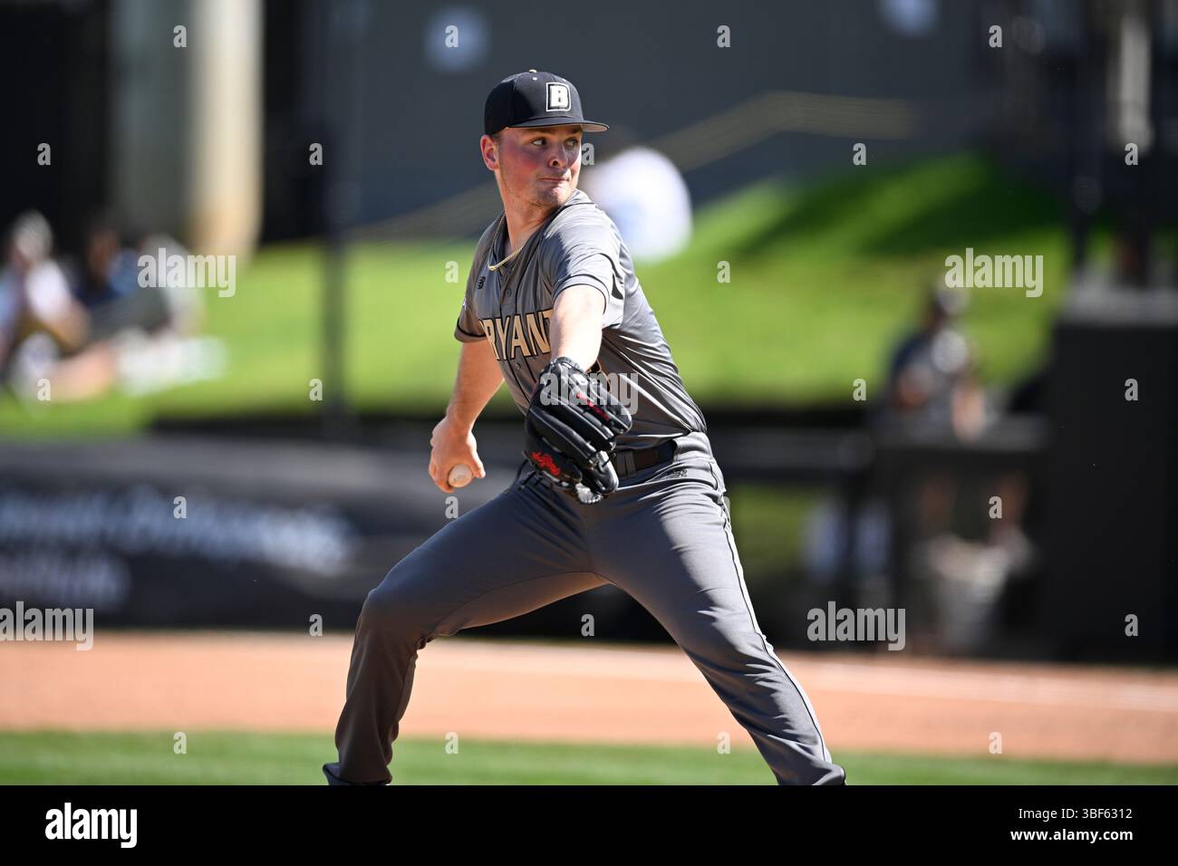 Bryant pitcher Brooks Ey (13) throws during an NCAA college baseball ...