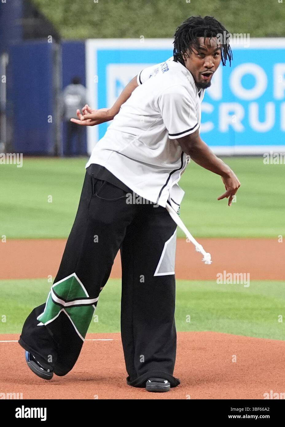 Miami Dolphins wide receiver Jaylen Waddle reacts after throwing a ...