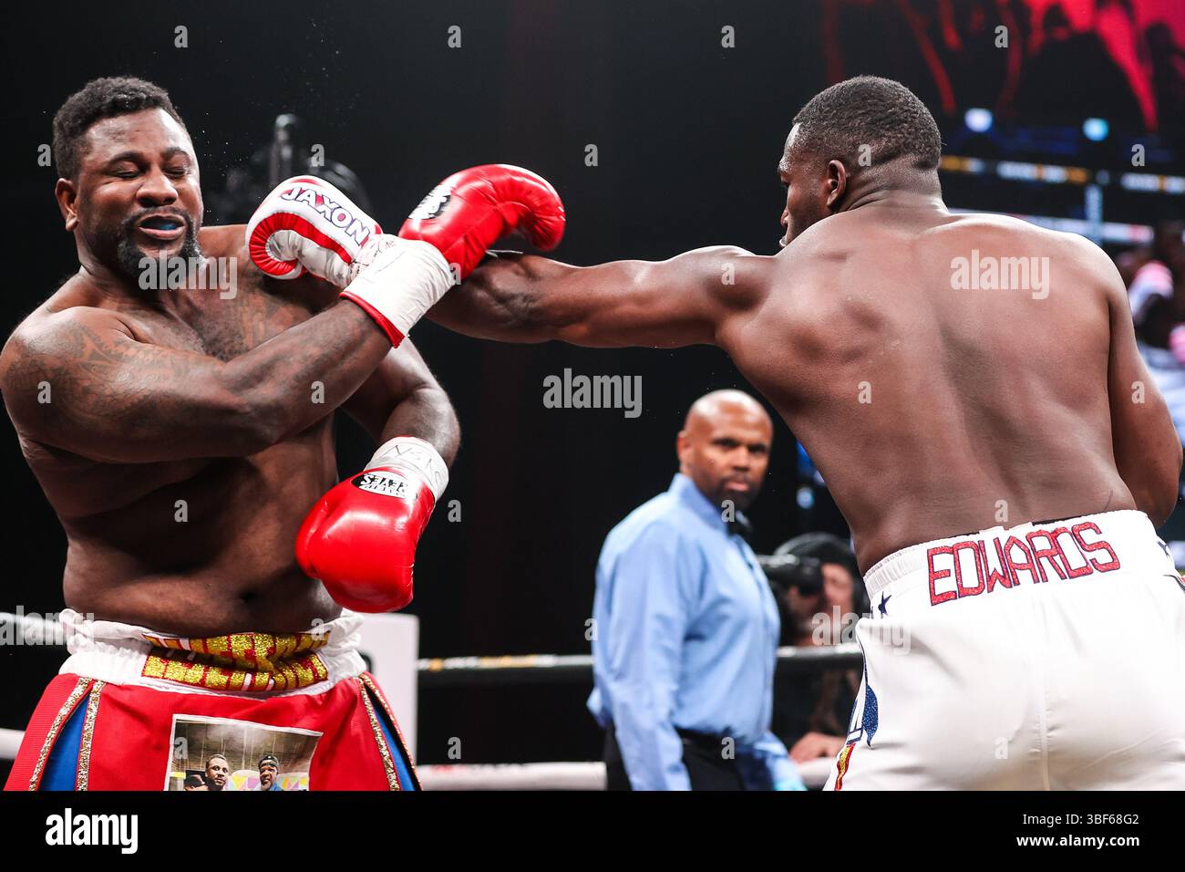 May 30, 2025: (R-L) Heavyweight Joshua Edwards punches Alexander Rhodes ...