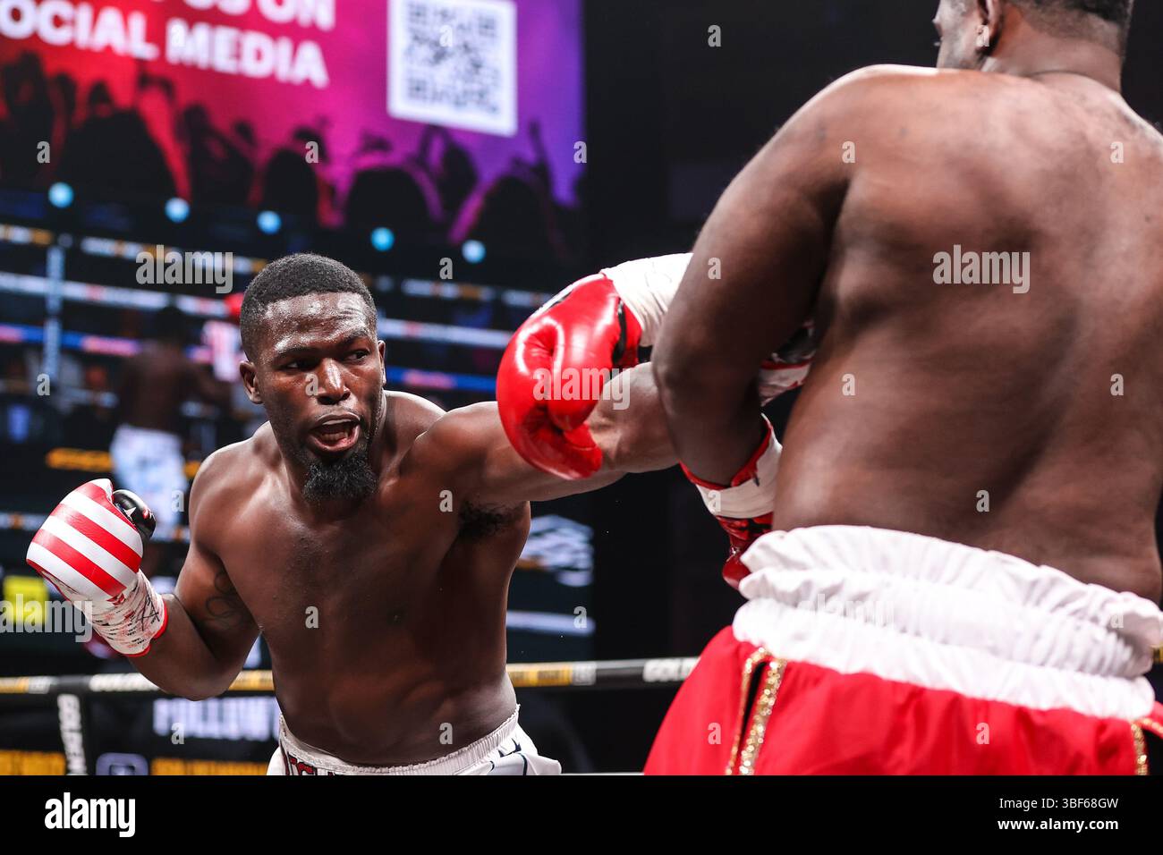 May 30, 2025: (L-R) Heavyweight Joshua Edwards punches Alexander Rhodes ...