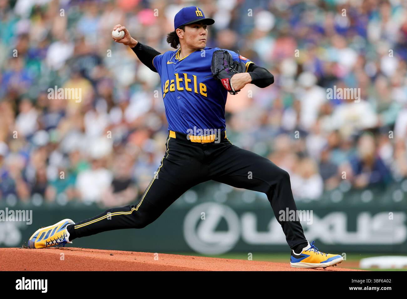 Seattle Mariners starting pitcher Bryan Woo throws during the first ...