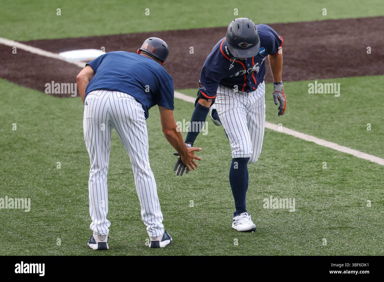 AUSTIN, TX - MAY 30: UTSA infielder Norris McClure (15) gets a high ...