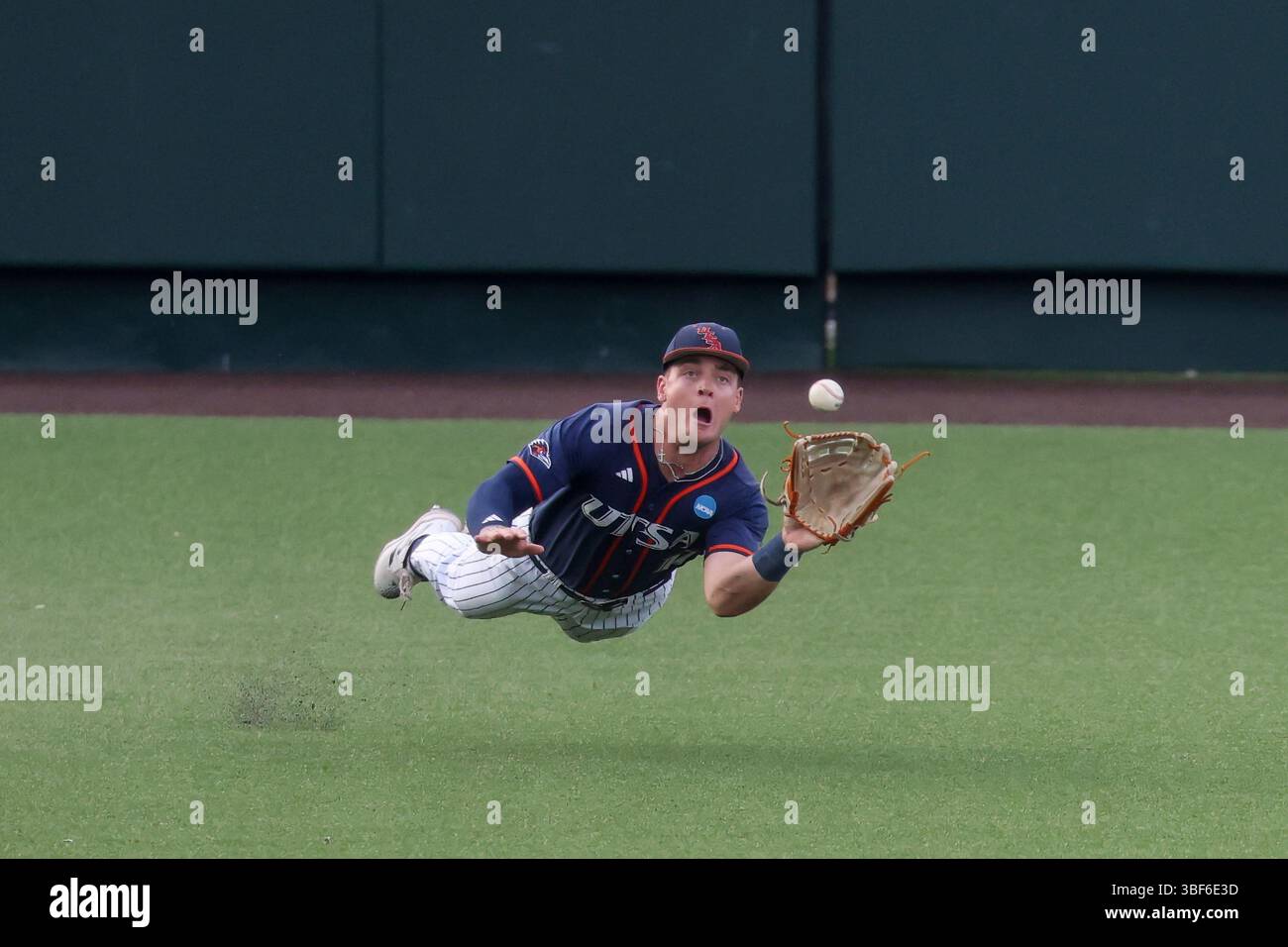 AUSTIN, TX - MAY 30: UTSA outfielder Drew Detlefsen (12) dives for a ...