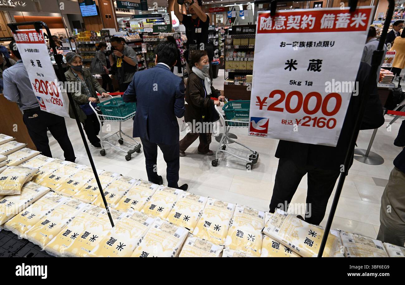 People get stockpiled rice at a store in Ota Ward, Tokyo on May 31 ...
