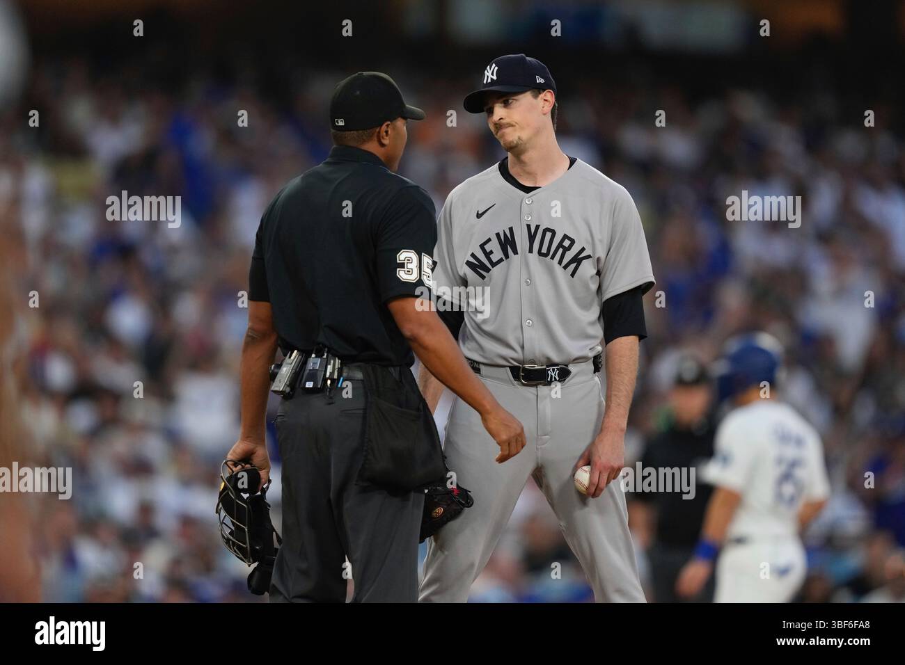 New York Yankees starting pitcher Max Fried right talks with home plate ...