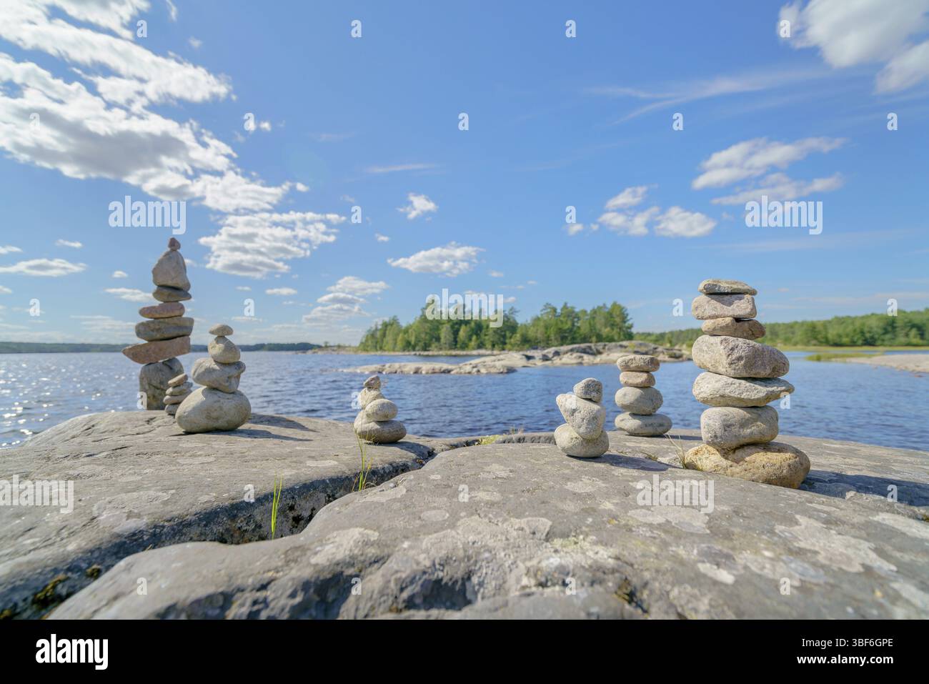 Pyramid of stones. Unstable balance of stone objects. Idyllic state of ...