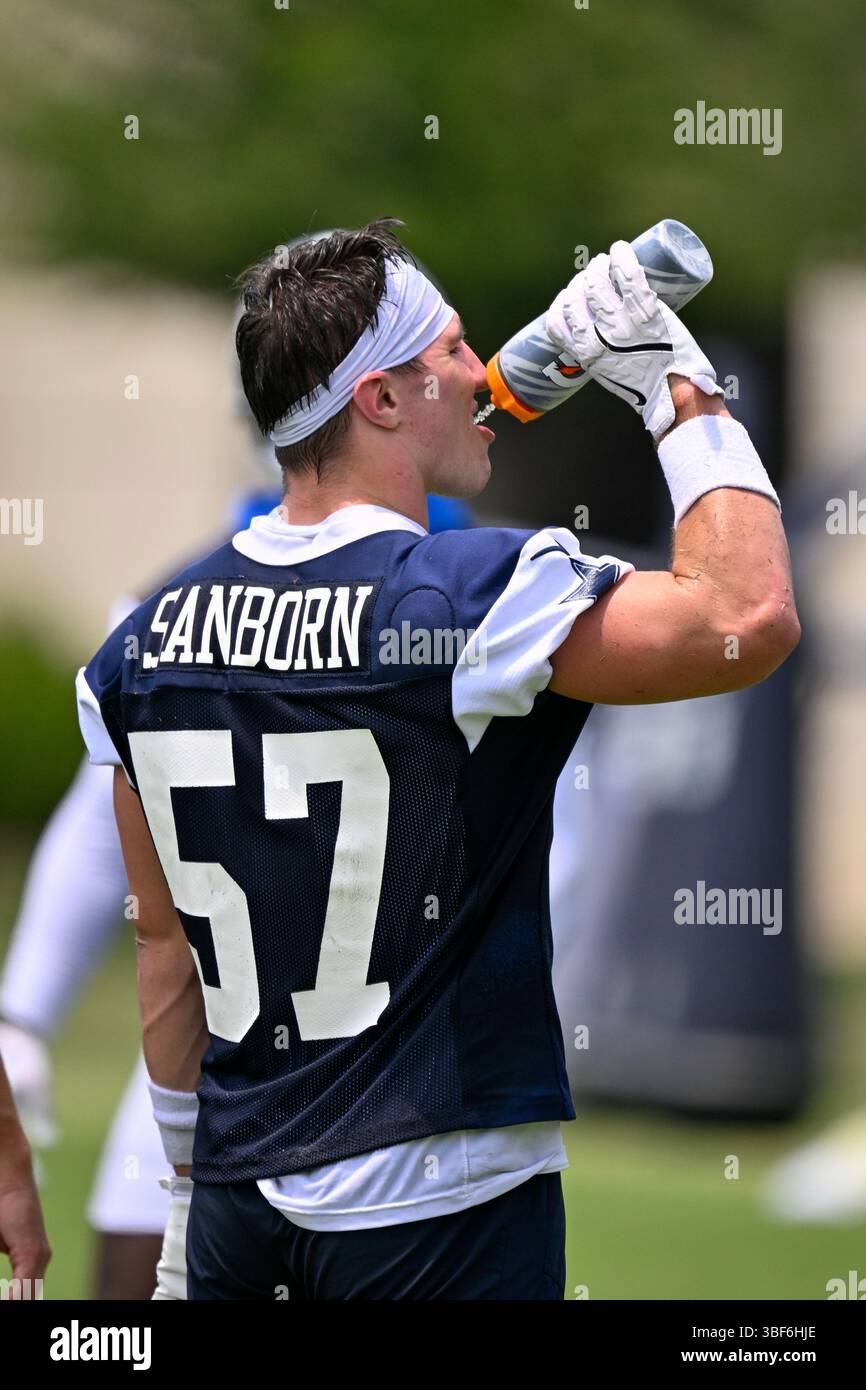 Dallas Cowboys linebacker Jack Sanborn drinks on the sidelines during ...