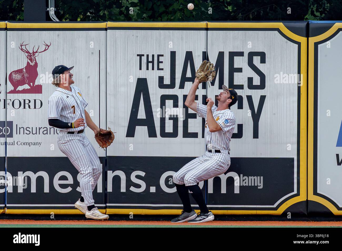 Southern Mississippi outfielder Jake Cook (2) makes an out next to ...