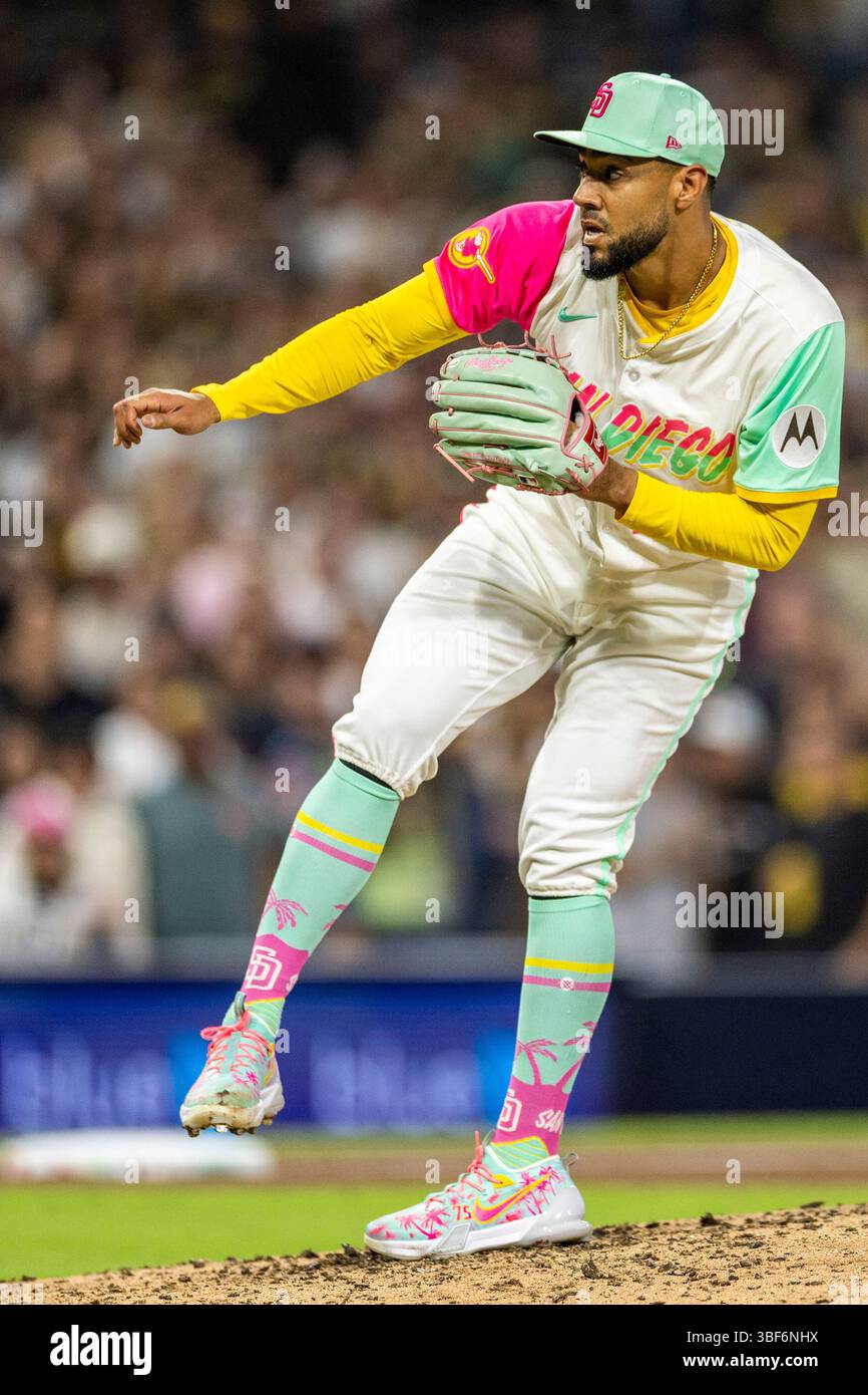 San Diego Padres relief pitcher Robert Suarez watches his throw against ...
