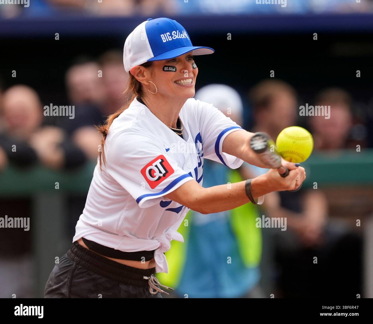 MAY 30, 2025: Tulsa King's Andrea Savage drives a pitch in the Big Slick softball game prior to ...