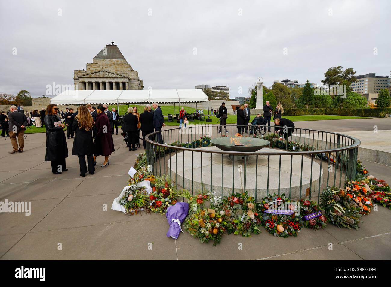People gather during the Victorian Aboriginal Remembrance Service to ...