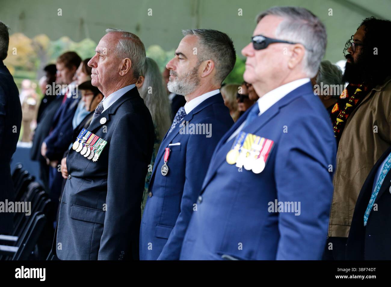 Former servicemen stand in reflection during the Victorian Aboriginal ...