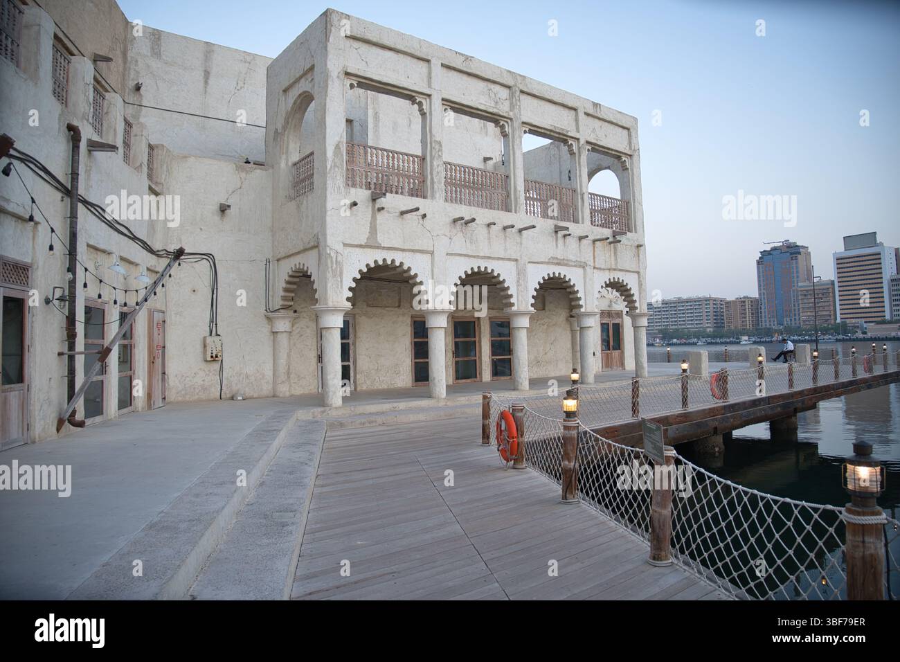 Traditional Emirati building with arched architecture at Al Seef, Dubai, overlooking the ...