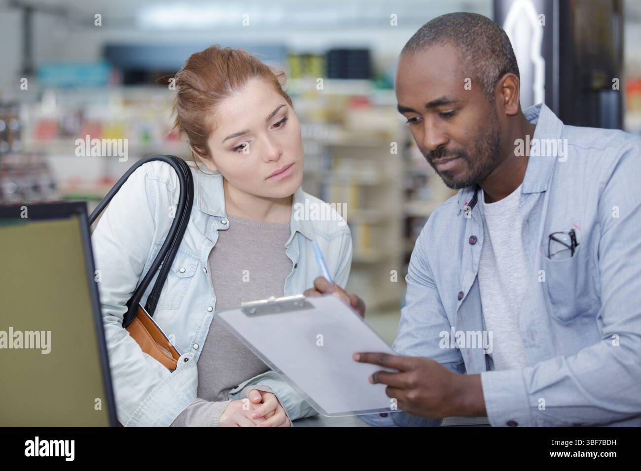 warehouse workers checking order list for collecting products Stock ...