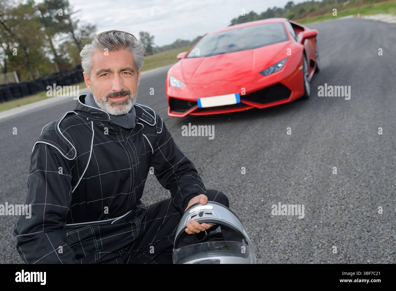 portrait of fast car driver Stock Photo - Alamy