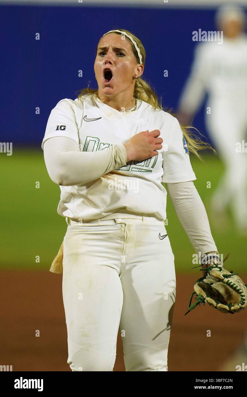 Oregon starting pitcher/relief pitcher Lyndsey Grein (33) celebrates ...