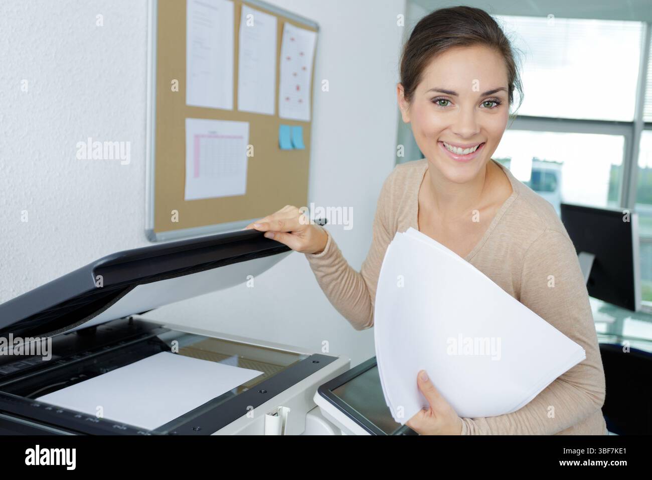 Portrait woman making photocopies hi-res stock photography and images ...