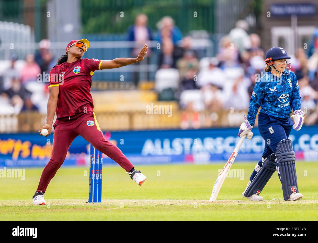 Hayley Matthews bowling for West Indies watched by Tammy Beaumont in a ...
