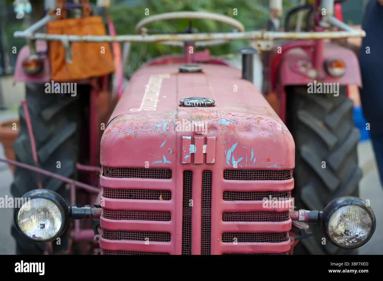 Farmall Tractor Front. The tractor front with round headlights and worn ...