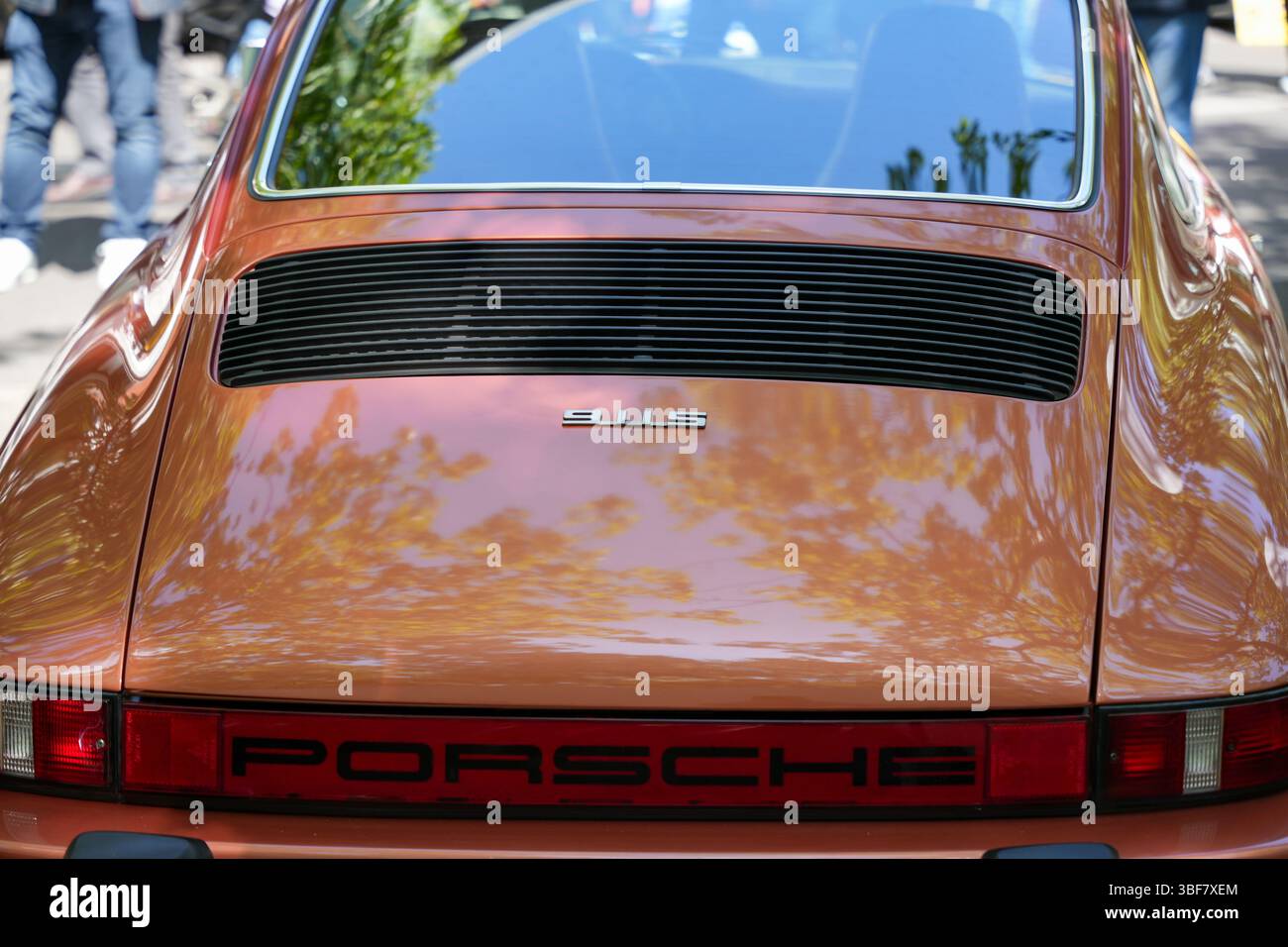 Porsche 911S back. The copper-colored Porsche 911S proudly displays its ...