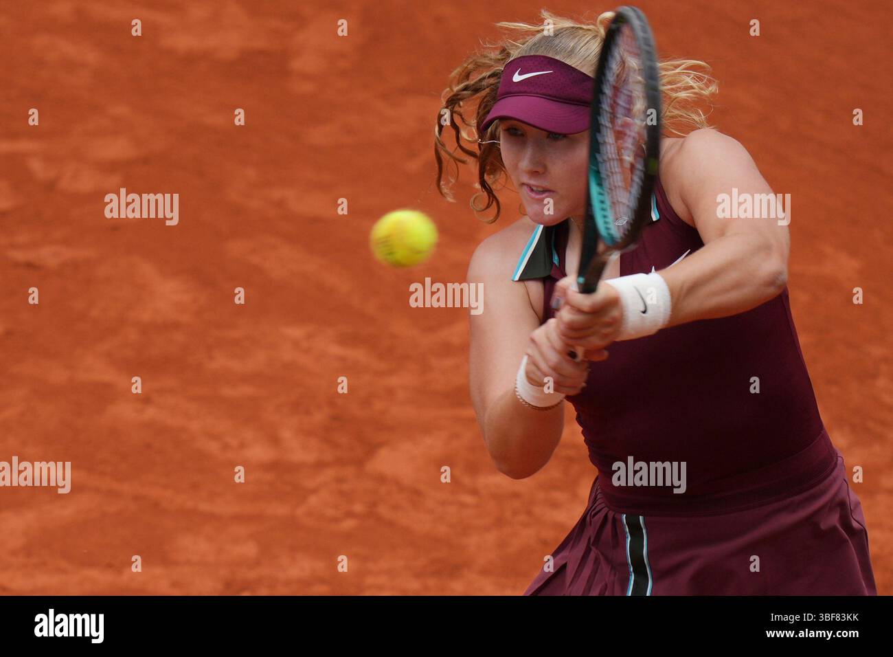 Russia's Mirra Andreeva returns the ball to Kazakhstan's Yulia Putintseva during their third ...