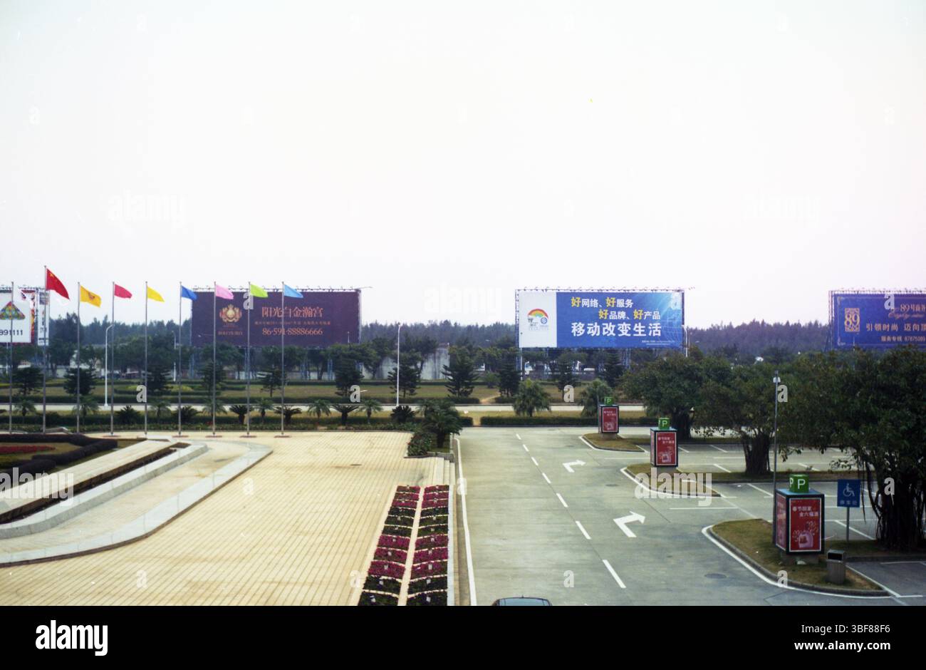 Parking Area at Fuzhou Changle International Airport with Flagpoles and ...