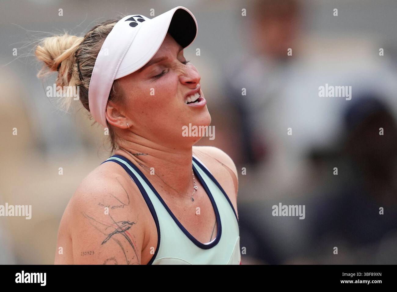 Marketa Vondrousova of the Czech Republic reacts as she plays Jessica ...