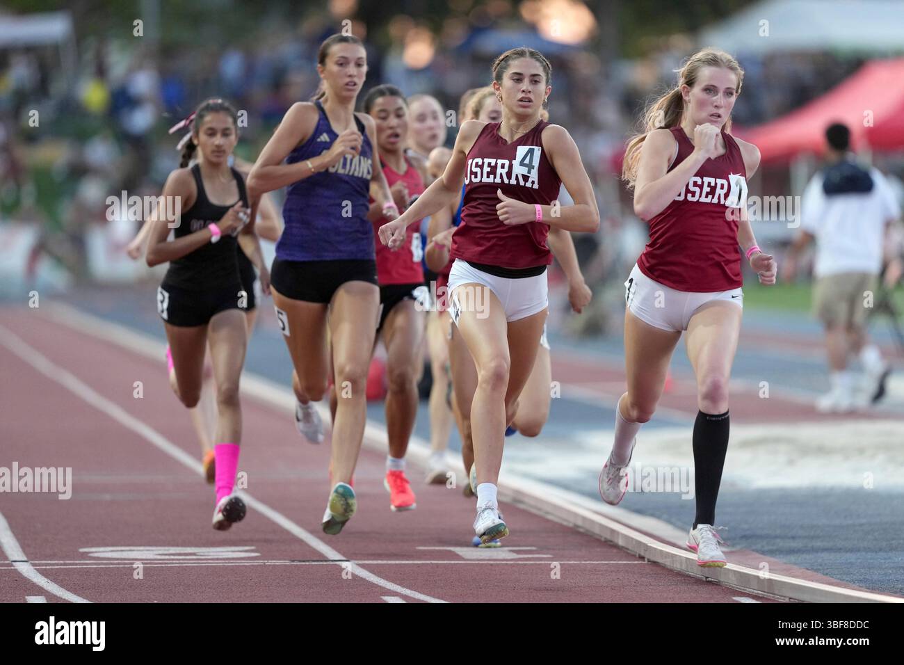 Anne Elise Packard (right) and Chloe Elbaz of JSerra place first and second in girls 800m heat ...