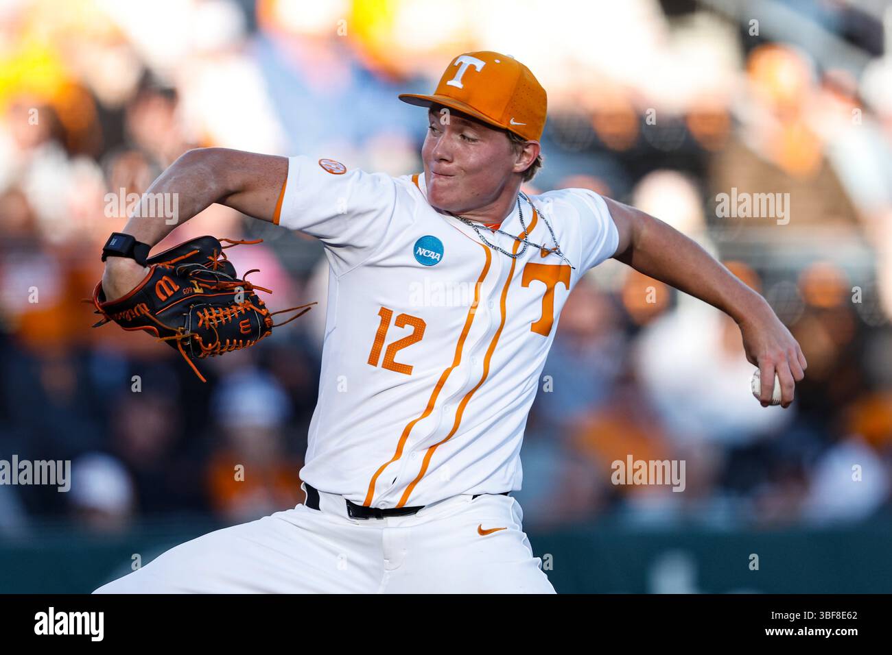 Tennessee pitcher Liam Doyle (12) throws to a batter during an NCAA regional baseball game ...
