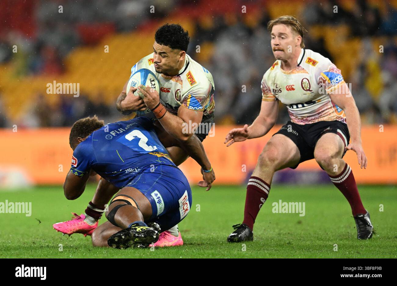 Brisbane, Australia. 31st May, 2025. Hunter Paisami (left) of the Reds ...